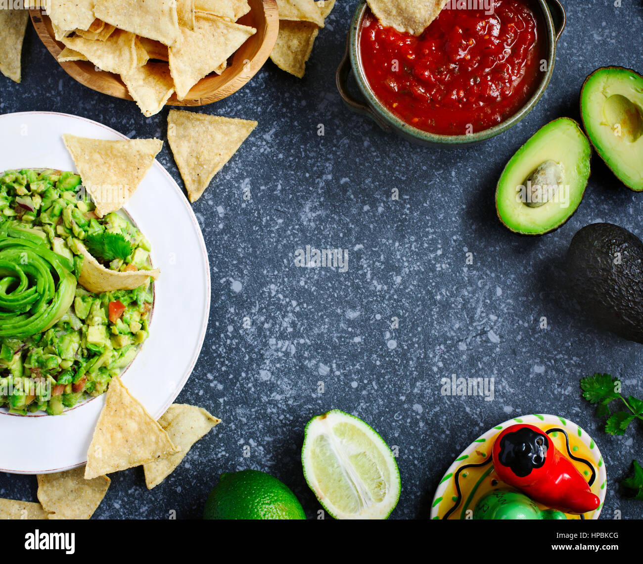 Traditional mexican sauces guacamole and salsa with fresh ingredients ...