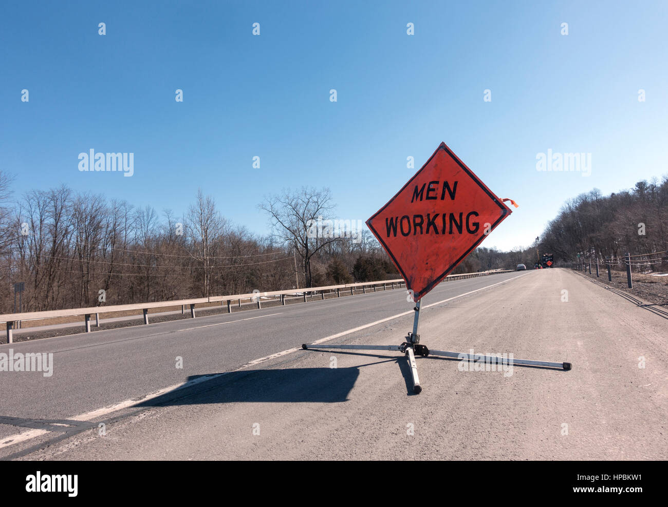 men working highway sign Stock Photo - Alamy