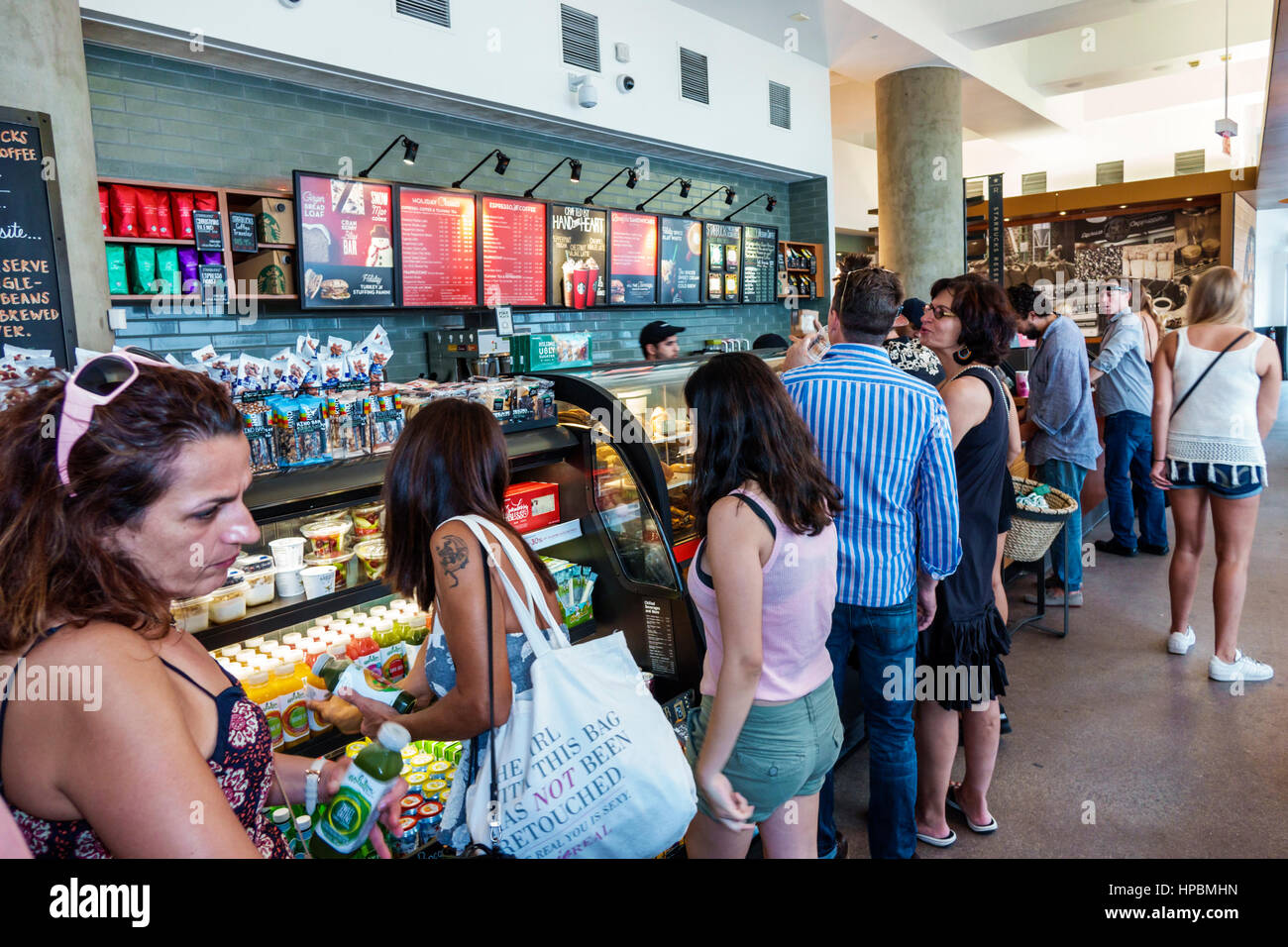 Queue line people starbucks cafe hi-res stock photography and images ...