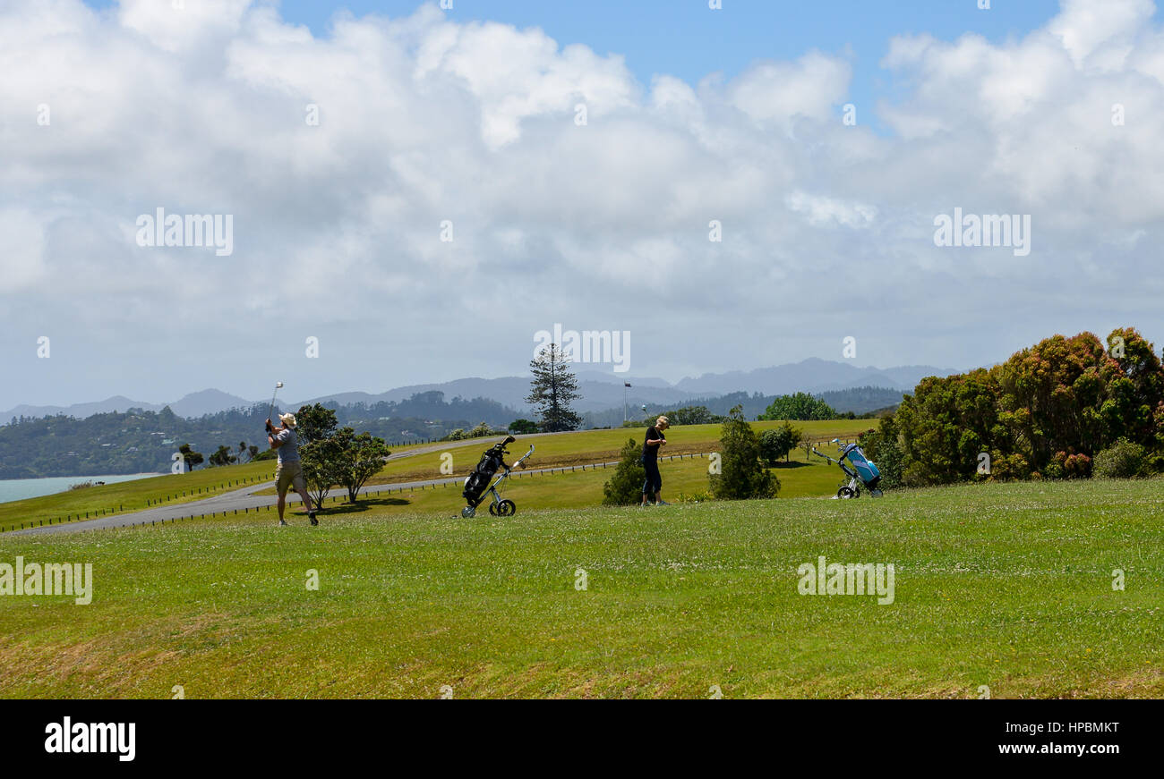 People play golf at Waitangi Golf Club, New Zealand Stock Photo - Alamy
