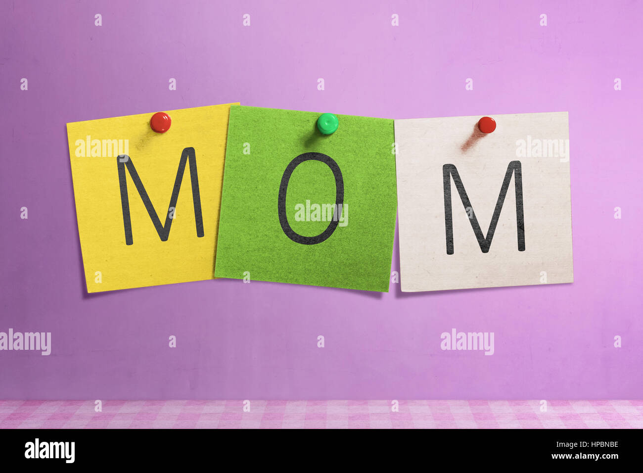 Mom text written on colorful paper note on pink wall background Stock ...