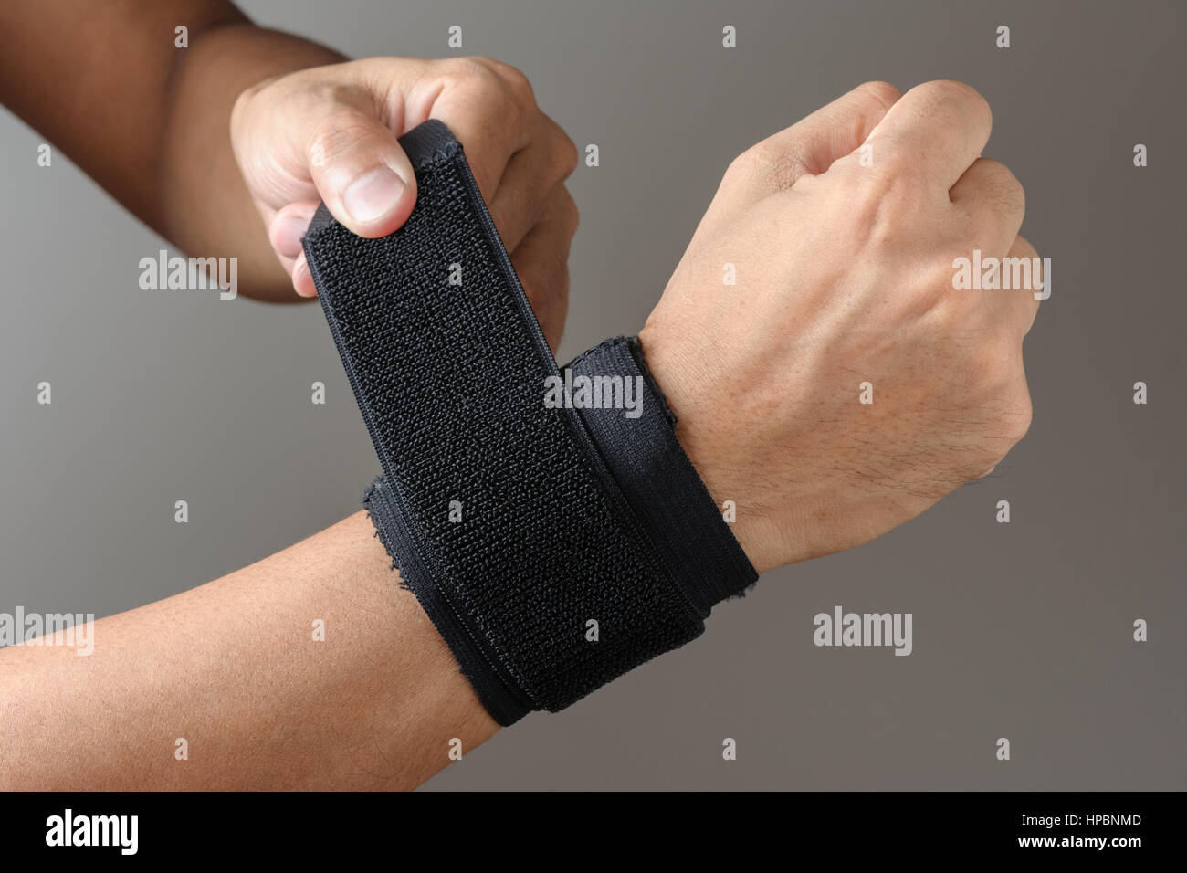 closeup hand with elastic wrist support, medical concept Stock Photo ...