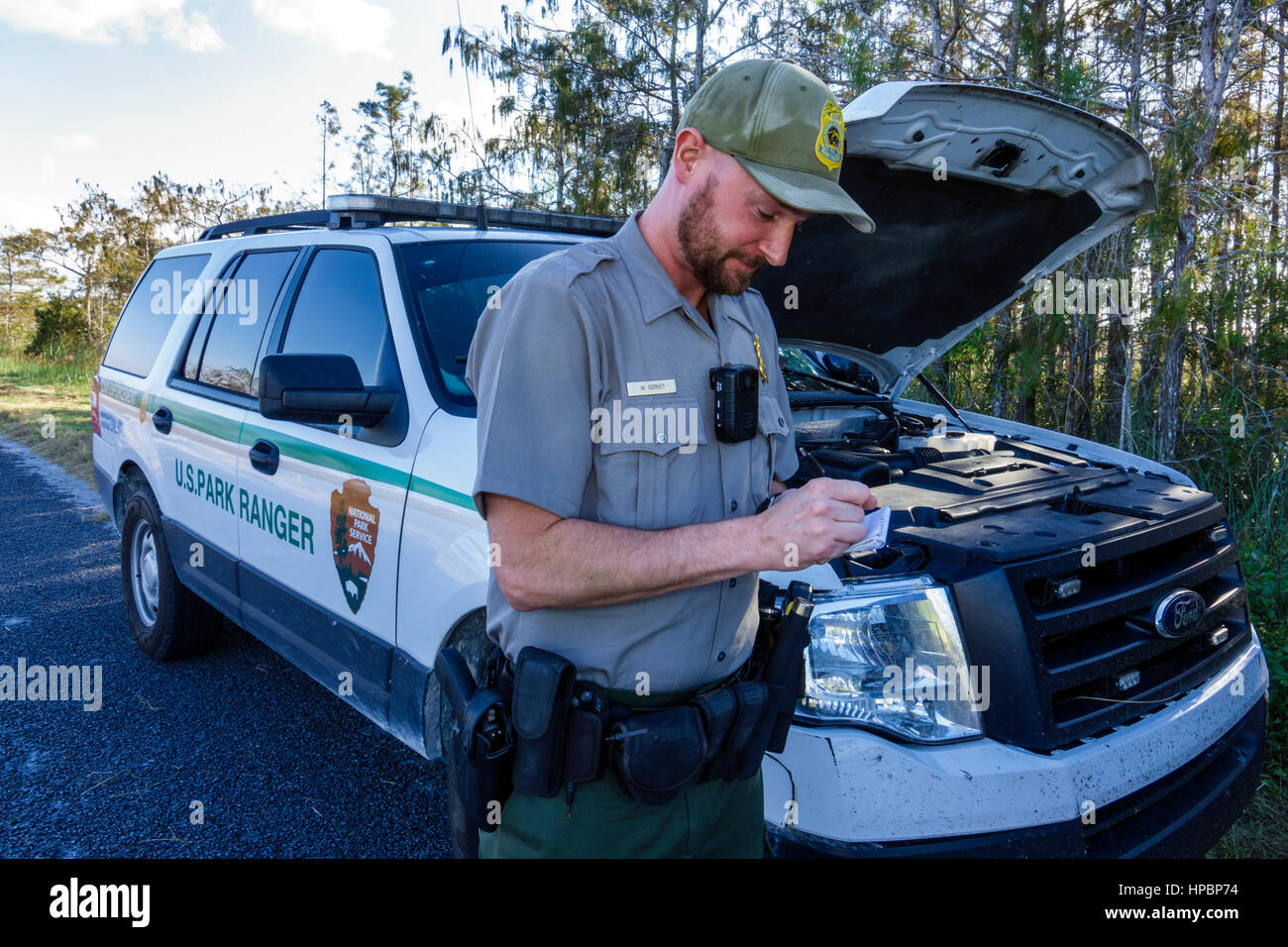 Florida Everglades National Park,park ranger,warden,writing,uniform,gun ...