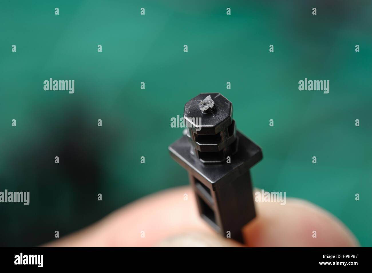 closeup section of plastic part after cut from toy sprue Stock Photo ...