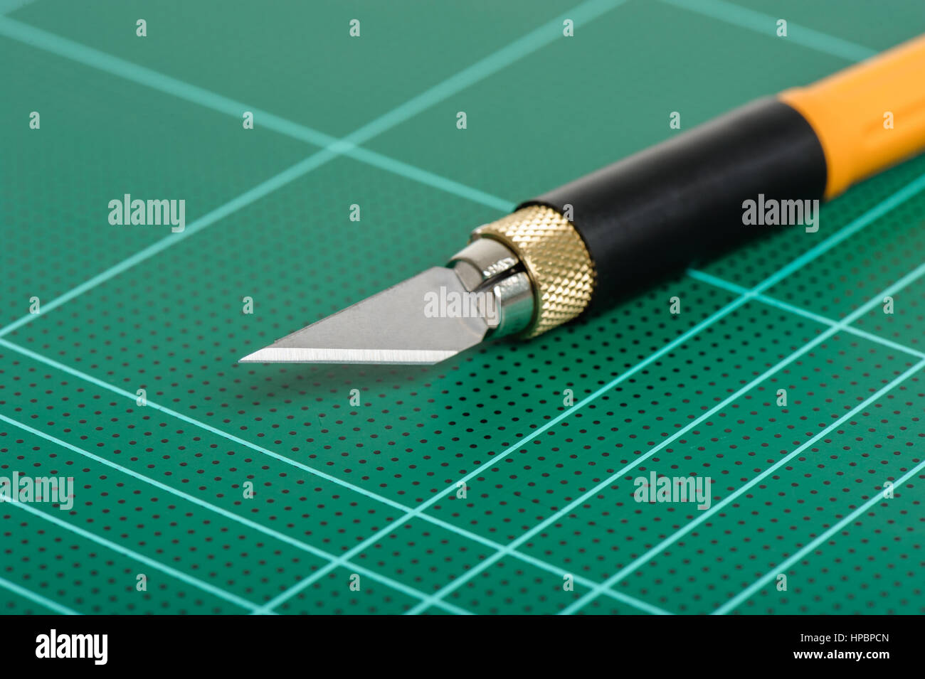 closeup craft knife with sharp blade, stationery Stock Photo - Alamy