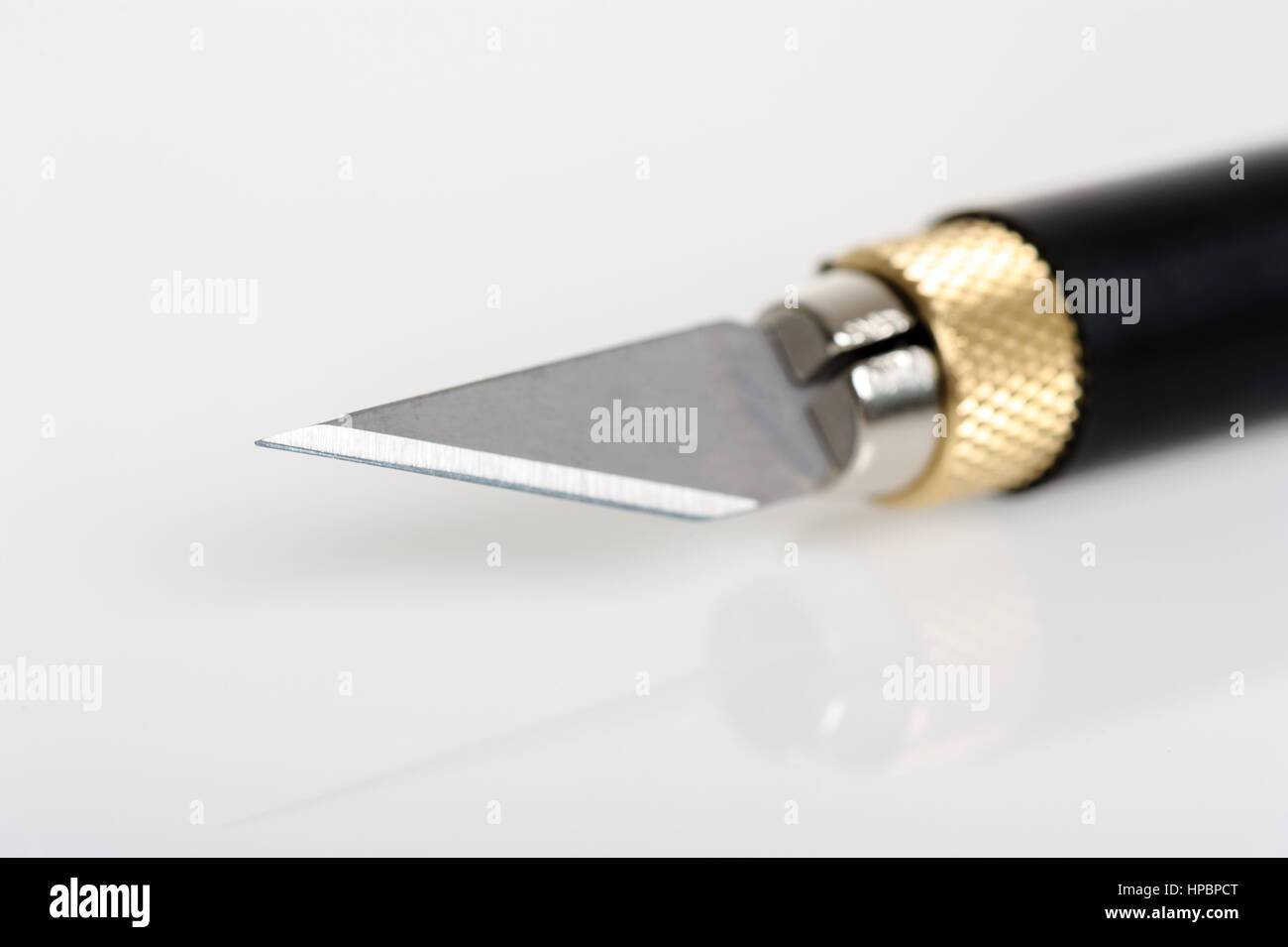 closeup sharp blade of craft knife, stationery Stock Photo - Alamy
