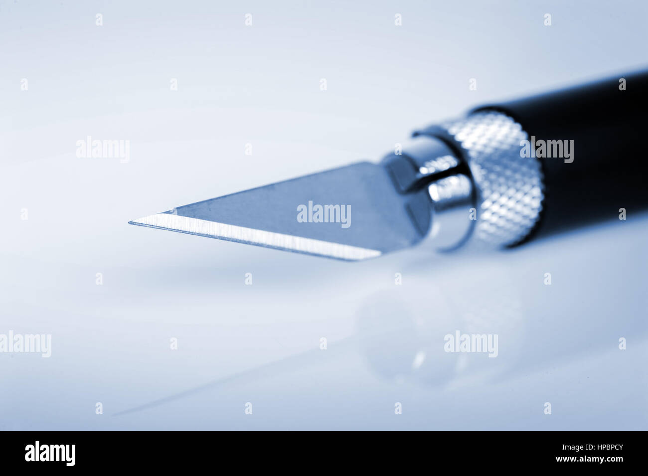 closeup sharp blade of craft knife, stationery Stock Photo - Alamy
