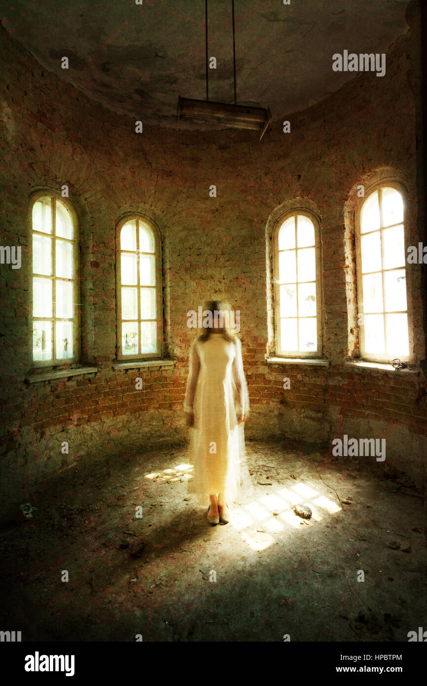 Horror ghost girl appears in an old building. Creepy movie scene Stock ...