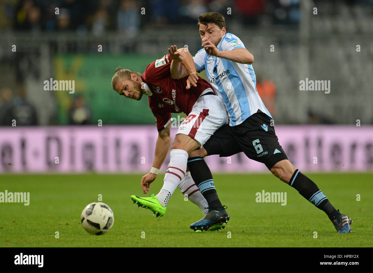 Munich's Sebastian Boenisch (r) and Nuremberg's Rurik Gislason in ...