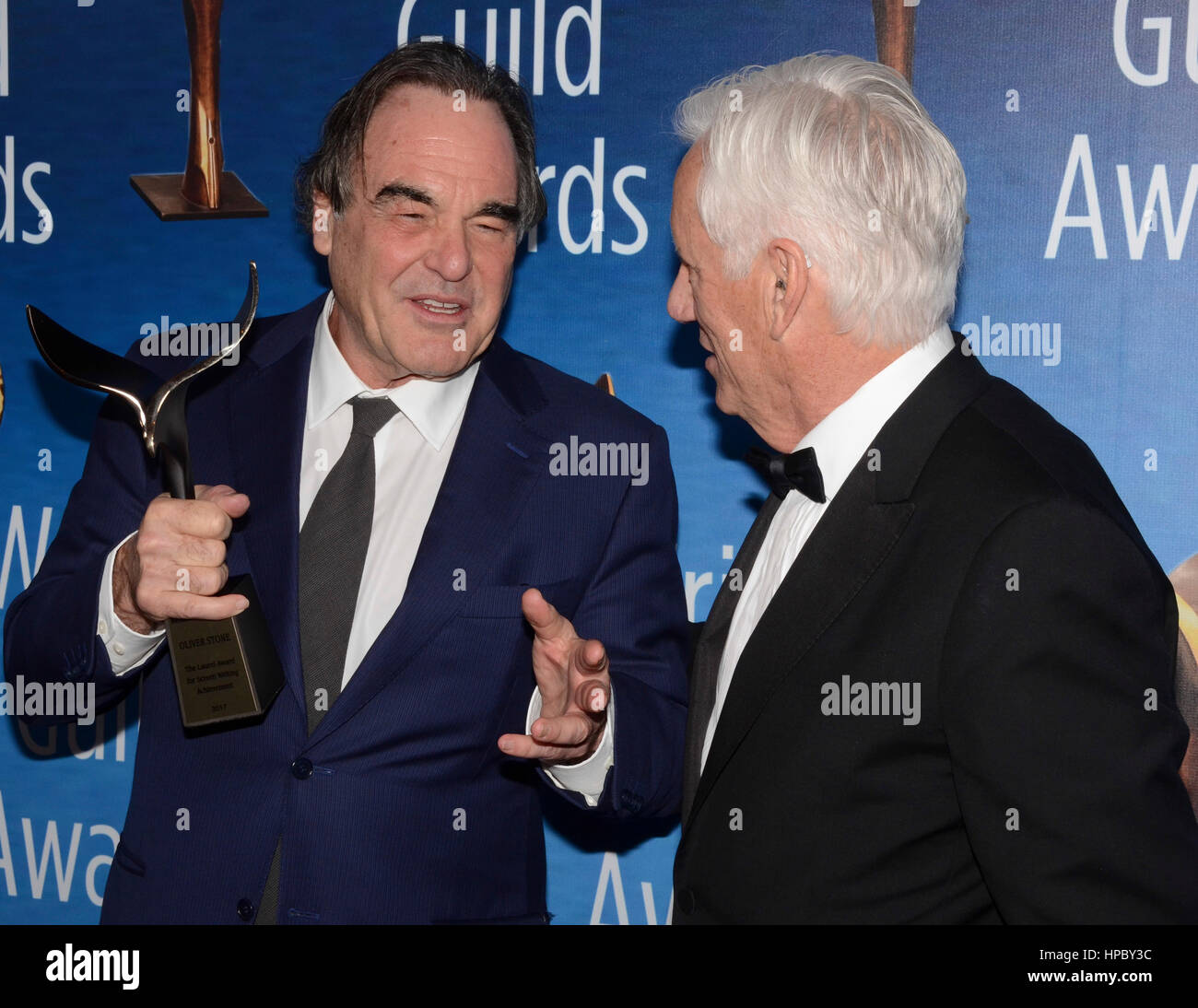Screenwriter/Director Oliver Stone and actor James Woods pose with the ...