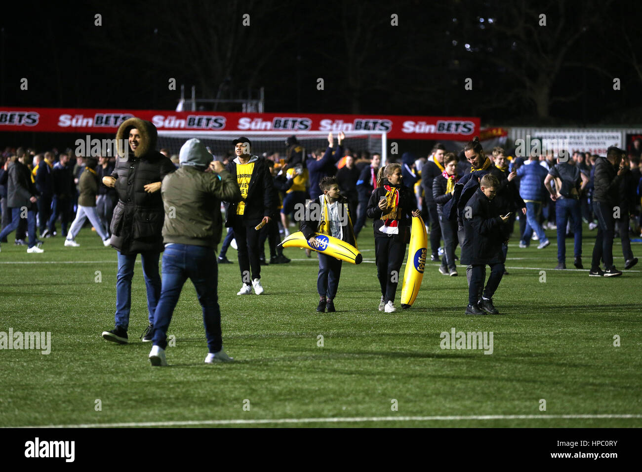 Sutton, UK. 20th Feb, 2017. The home fans invade the pitch at the end ...