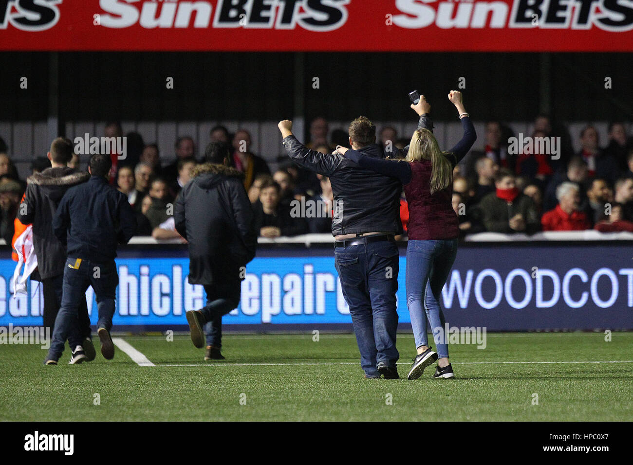 Sutton, UK. 20th Feb, 2017. The Sutton fans invade the pitch at the end ...