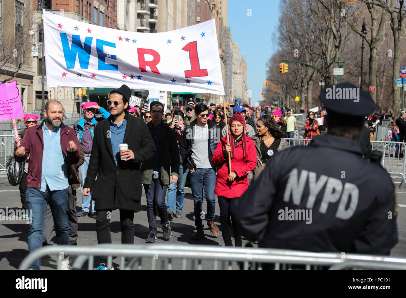New York, USA. 20th Feb, 2017. People walk to the rally area as they ...