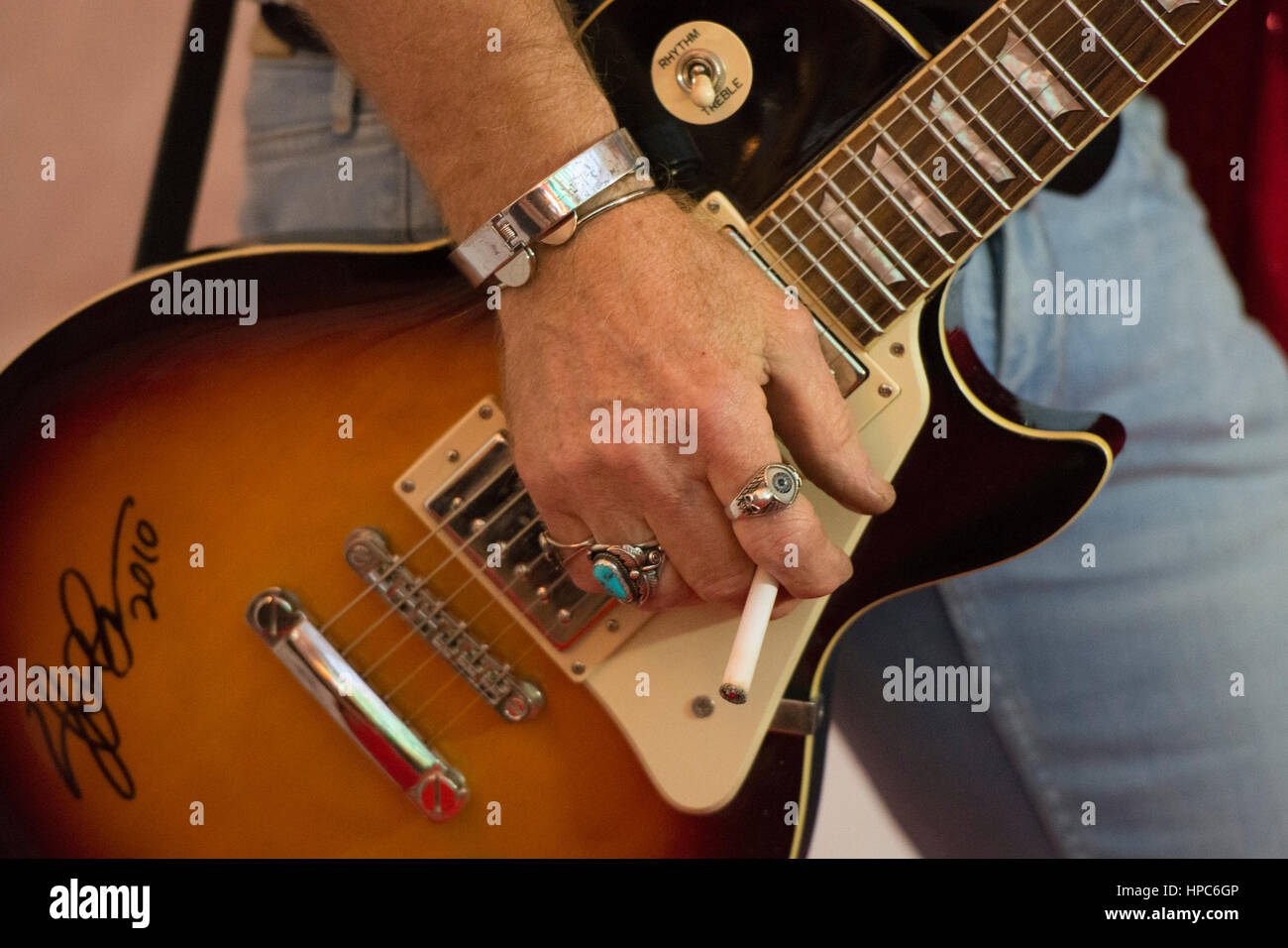 Las Vegas, USA. 20th Feb, 2017. Slash impersonator Rob Valentine, left ...
