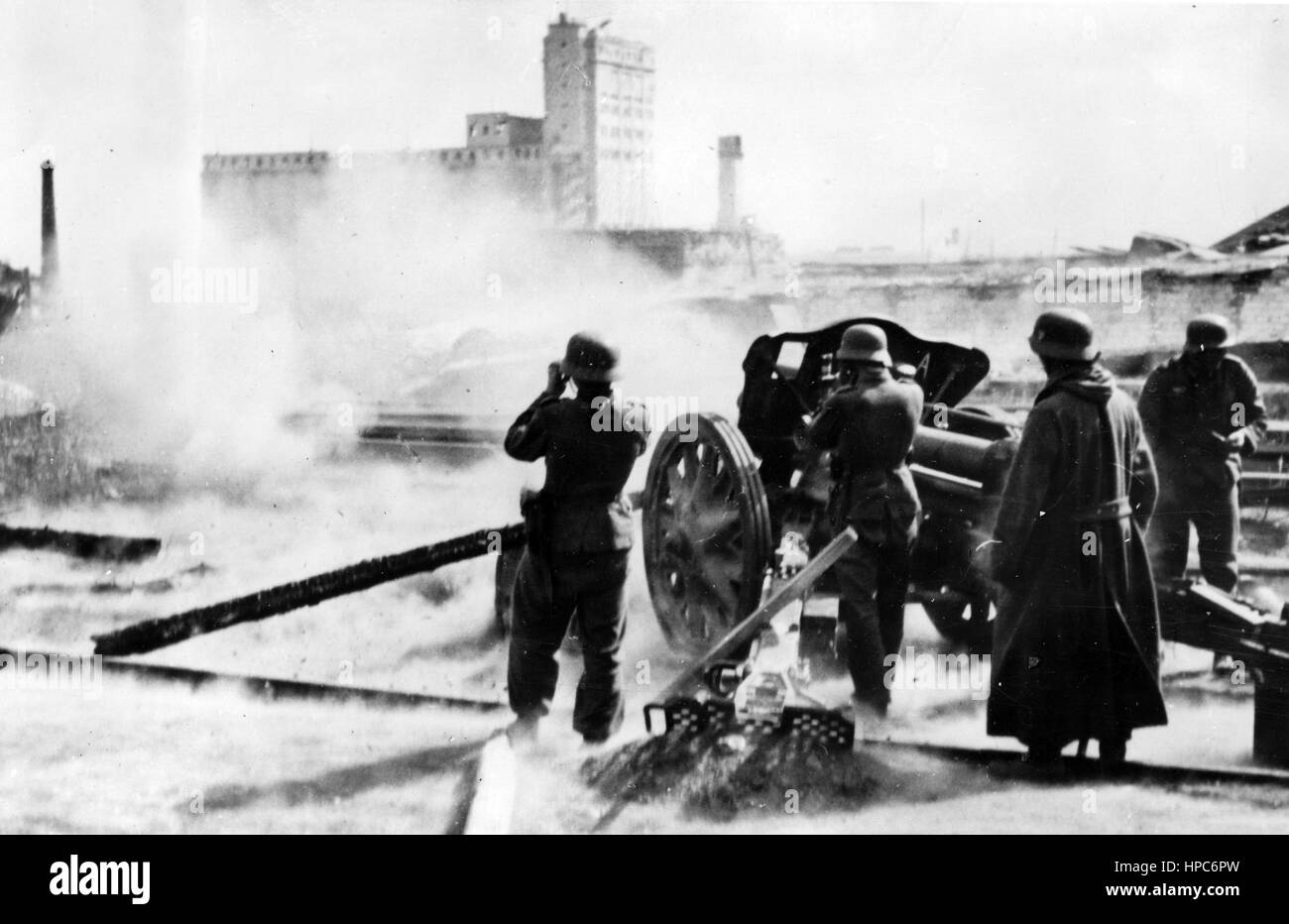 The Nazi propaganda image shows German Wehrmacht artillery in use in ...