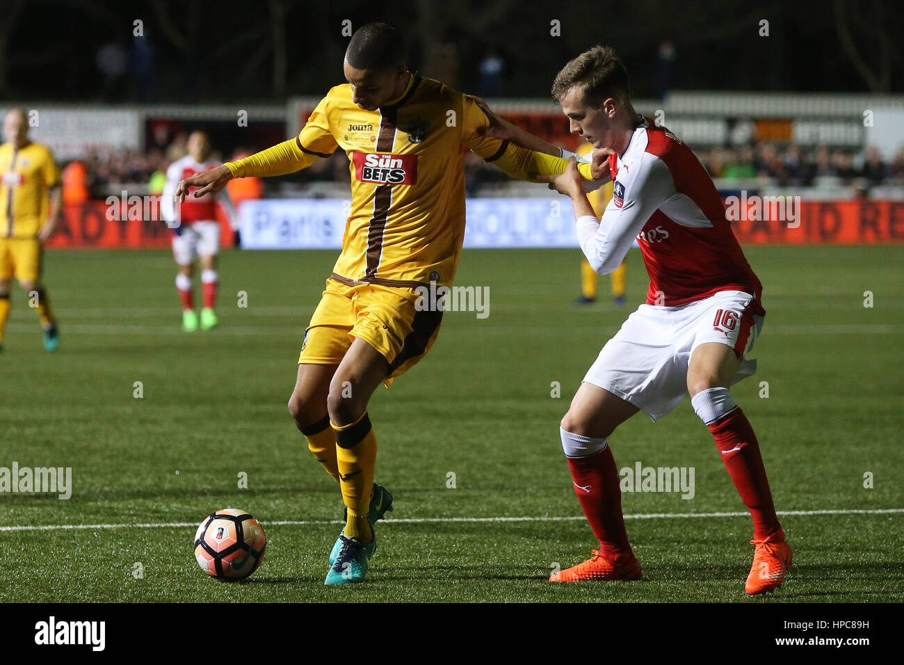 Sutton, UK. 20th February 2017. Craig Eastmond of Sutton United and Rob ...