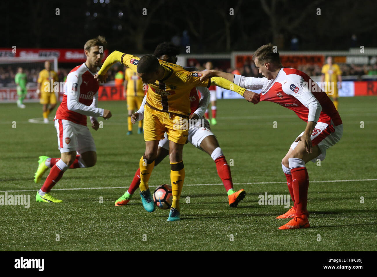 Sutton, UK. 20th February 2017. Craig Eastmond of Sutton United and Rob ...