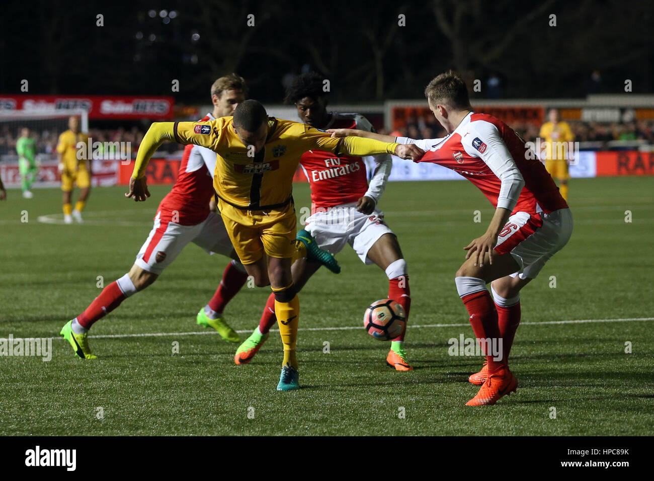 Sutton, UK. 20th February 2017. Craig Eastmond of Sutton United and Rob ...