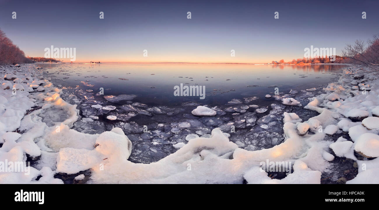 Frozen bay in the morning. Bright winter landscape Stock Photo - Alamy