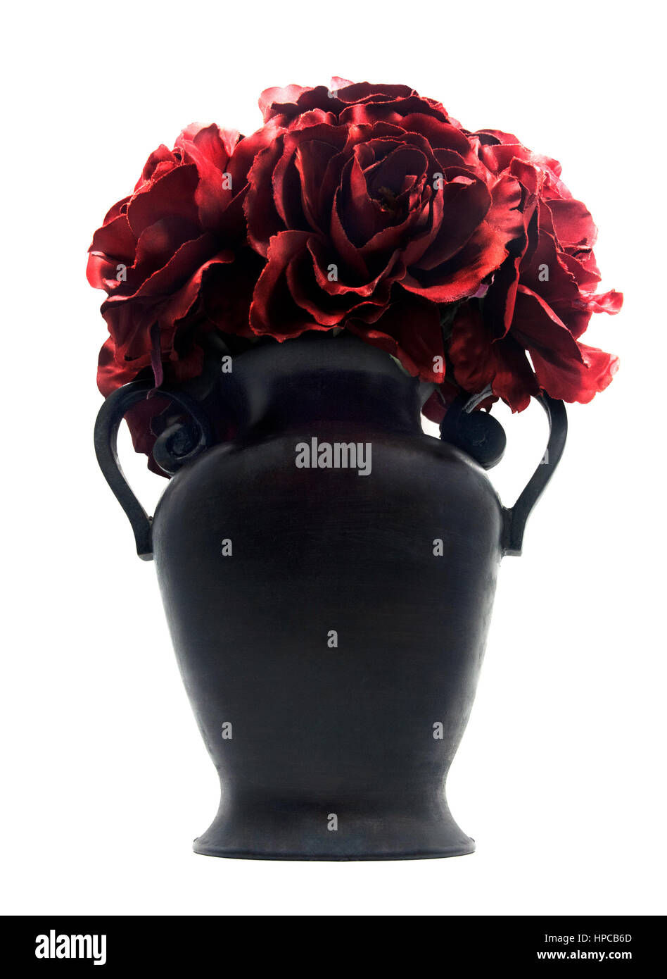 Isolated vase with red flowers Stock Photo - Alamy