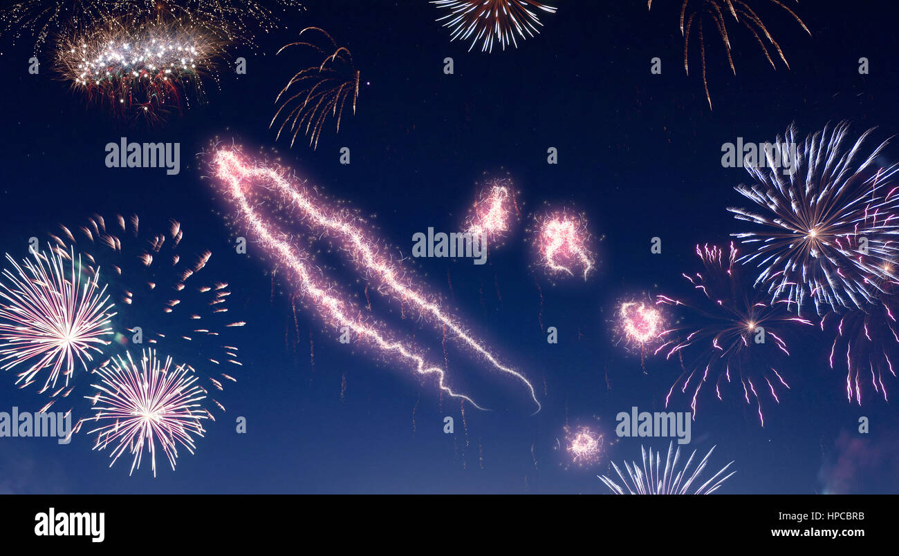 A dark night sky with a sparkling red firecracker in the shape of New ...