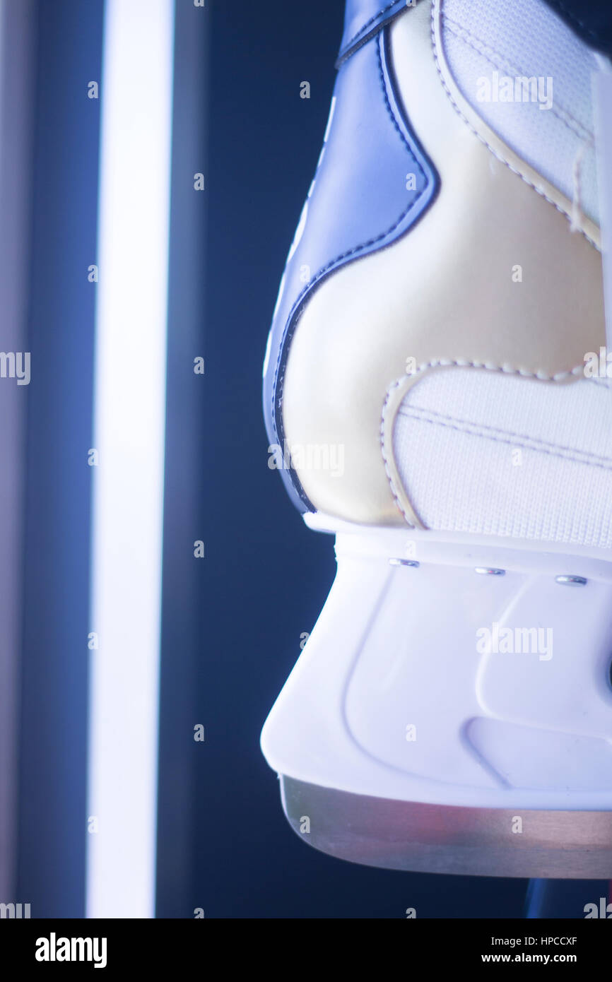 Ice skates in retail skate shop window display on sale Stock Photo - Alamy