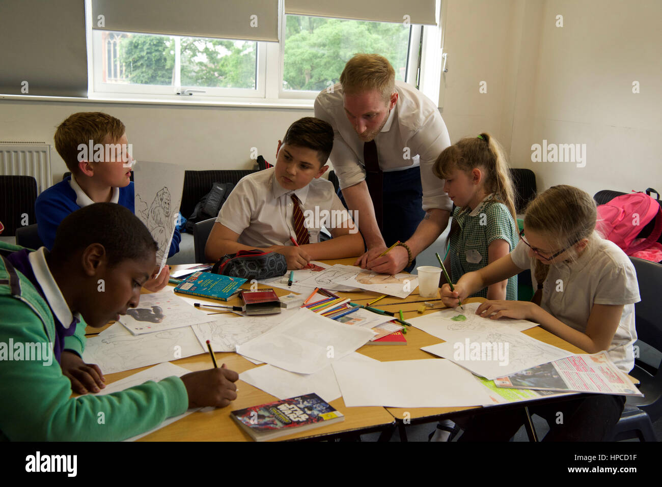 Learning together in a London School Stock Photo, Royalty Free Image ...