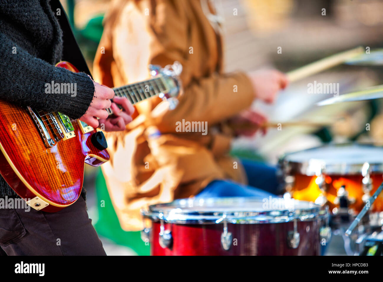 Festival music band. Friends playing on percussion instruments city ...