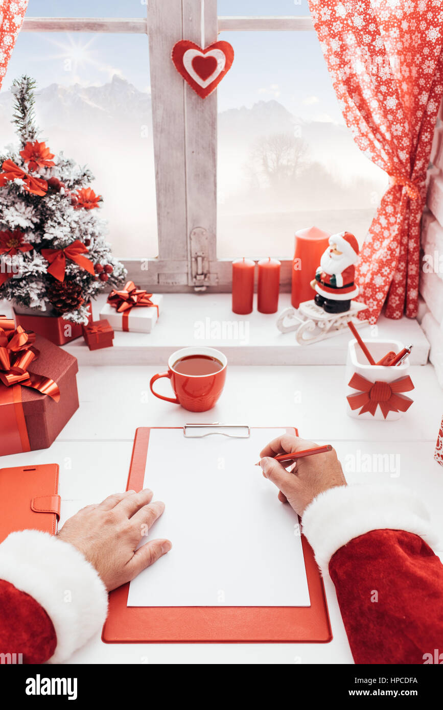 Hands writing santa claus hi-res stock photography and images - Alamy