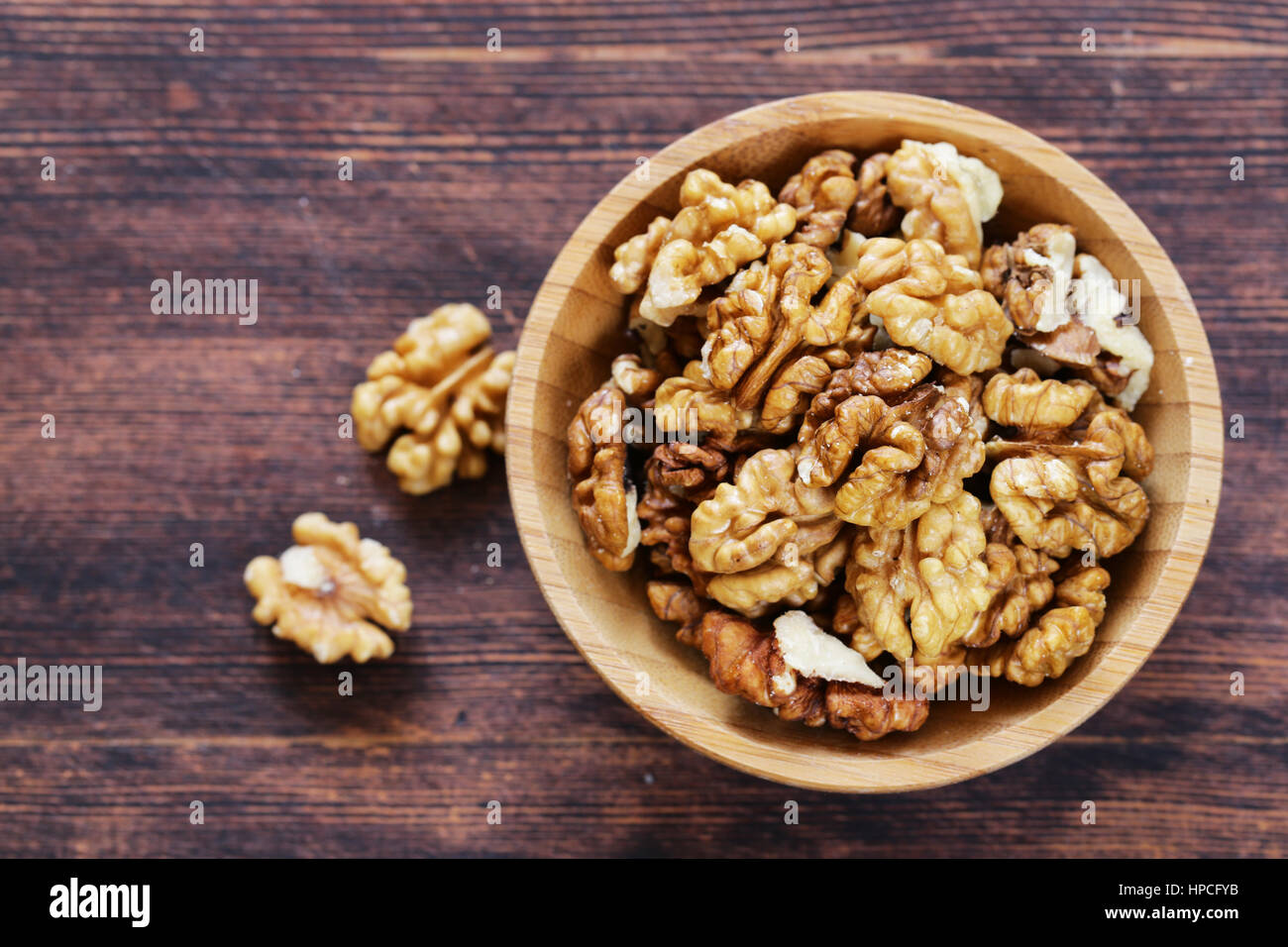 organic peeled nuts walnut on a wooden background Stock Photo - Alamy