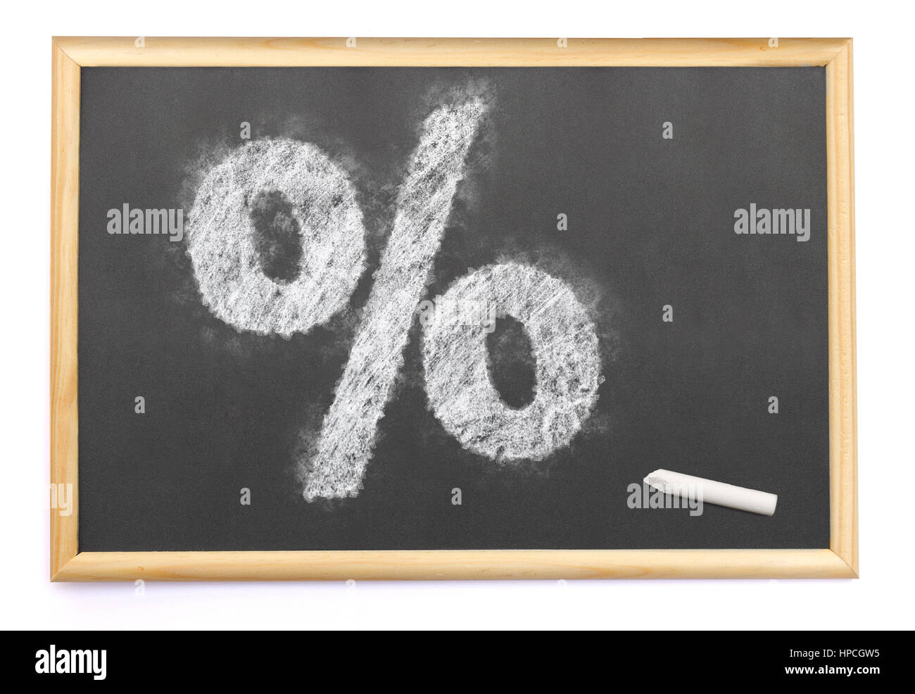 Blackboard with a percent symbol drawn on and a single chalk.(series ...