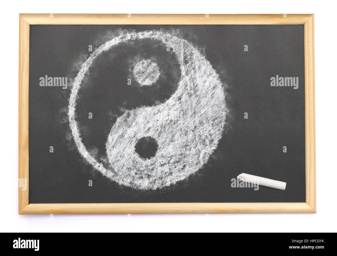 Blackboard with a Ying Yang symbol drawn on and a single chalk.(series ...