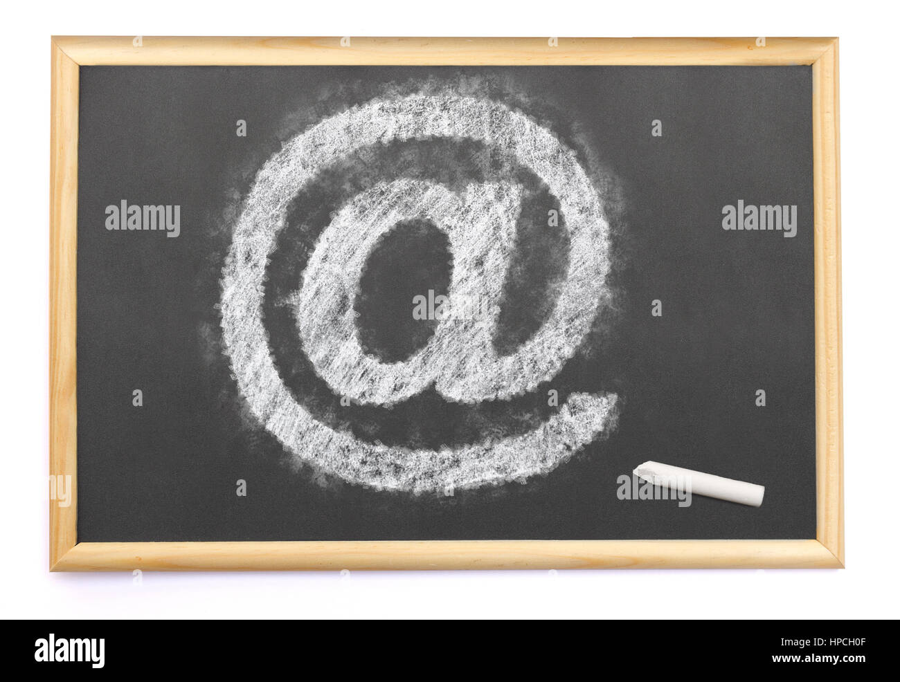 Blackboard with an at symbol drawn on and a single chalk.(series Stock ...