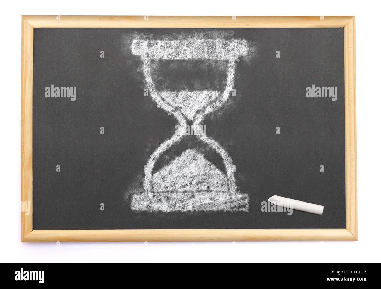 Blackboard with an hourglass drawn on and a single chalk.(series Stock ...