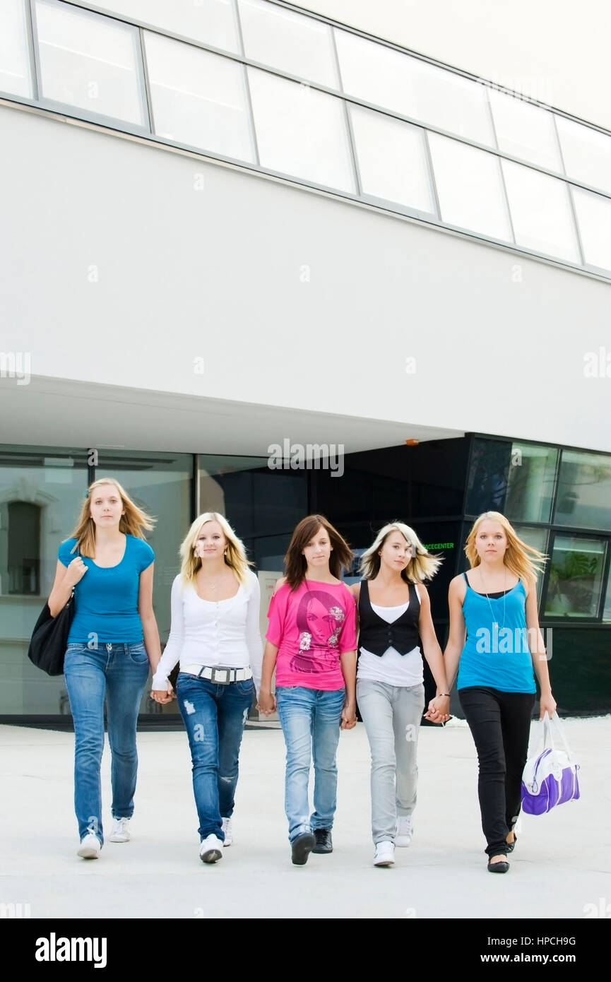 five girls infront of school Stock Photo - Alamy