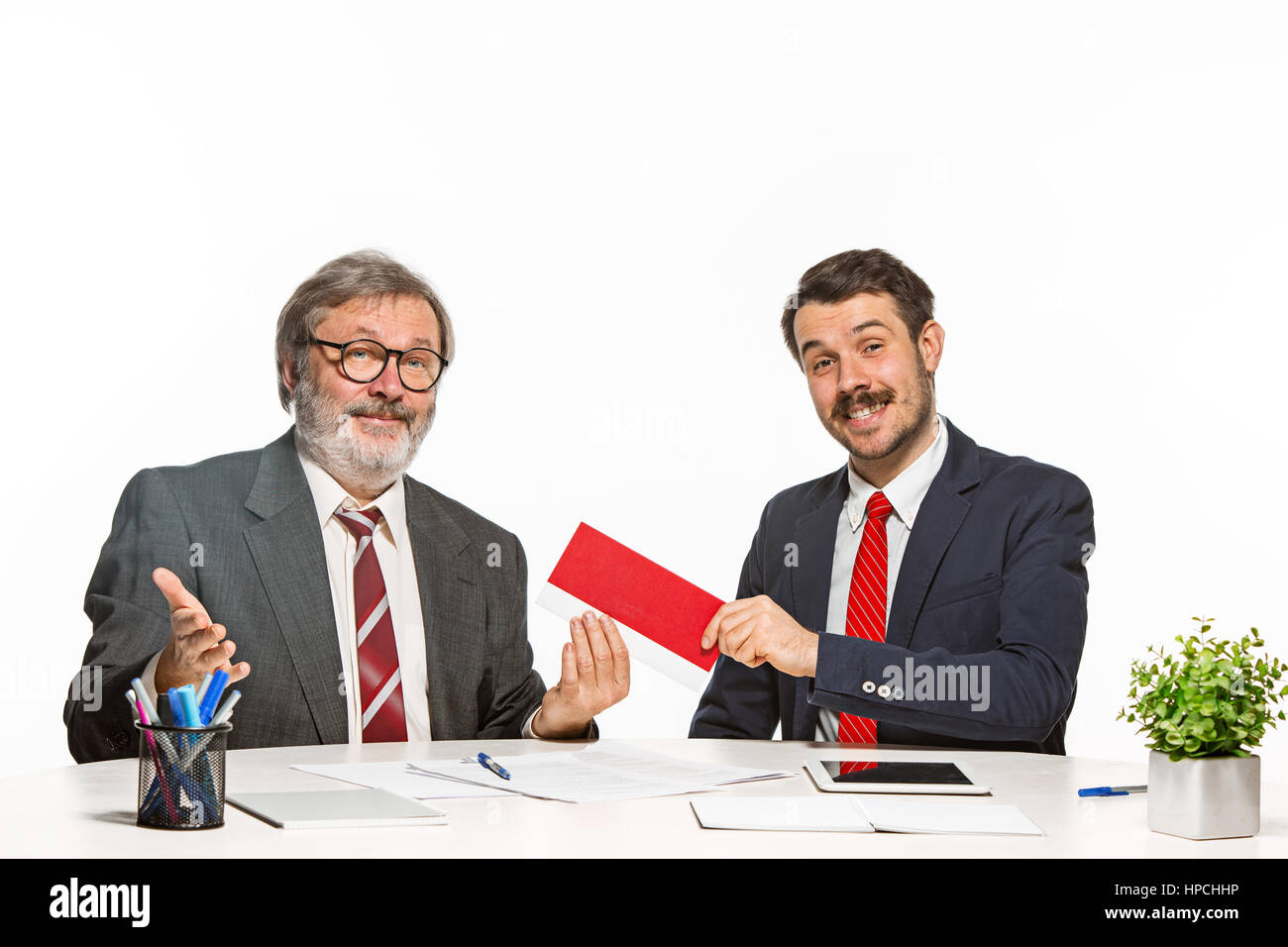 Concept - corruption. Businessman in a suit taking a bribe at office on ...