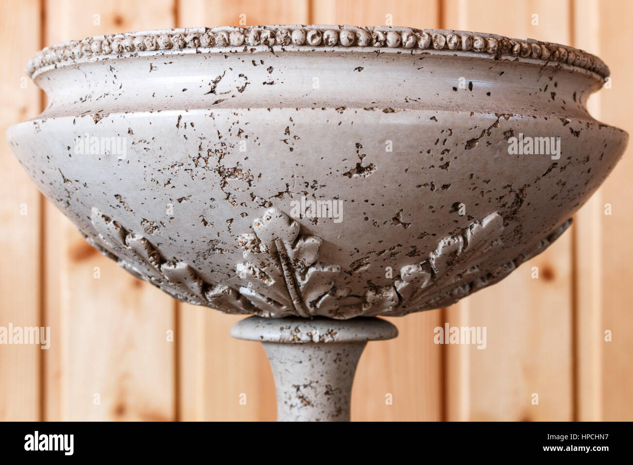 Beautiful old vase on a table close-up Stock Photo - Alamy