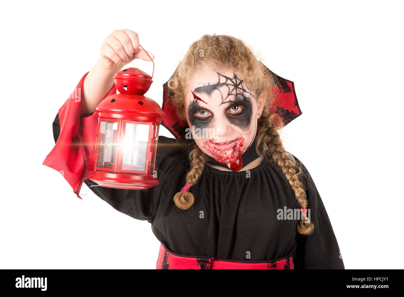 Girl with face-paint and vampire Halloween costume isolated in white ...