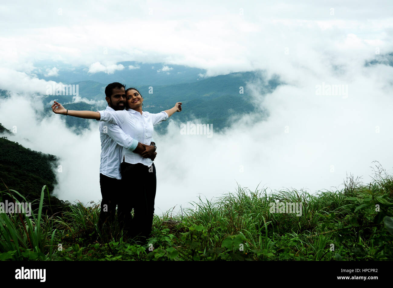 Hugging couple in high mountains, couple hugging in beautiful mountains ...