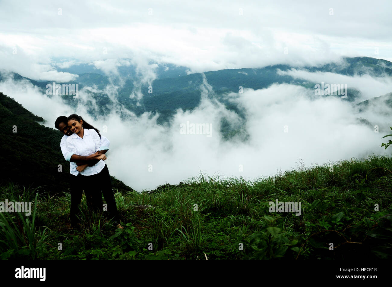 Hugging couple in high mountains, couple hugging in beautiful mountains ...