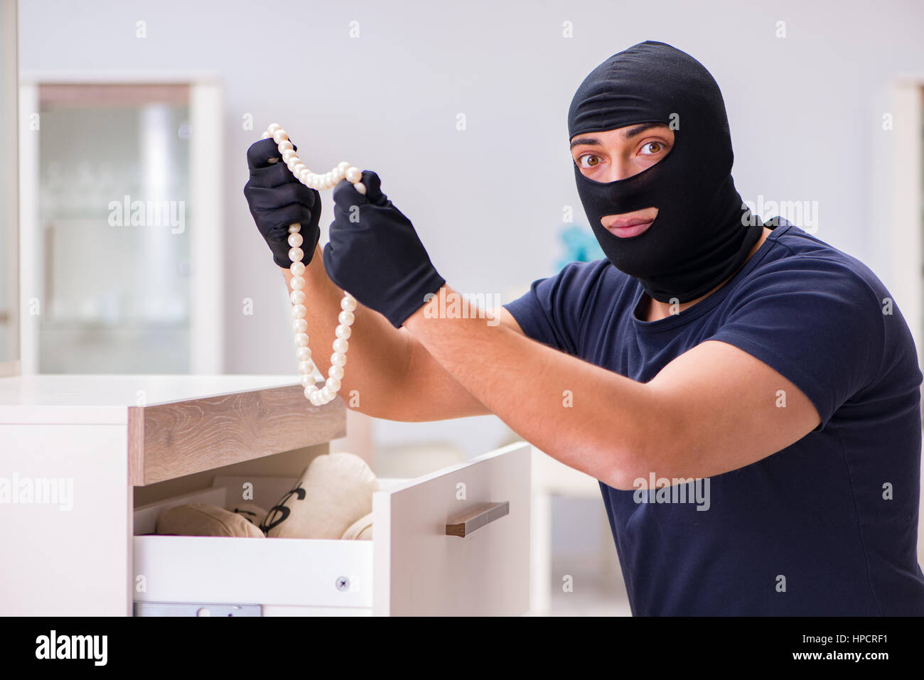Burglar diamond thief hi-res stock photography and images - Alamy