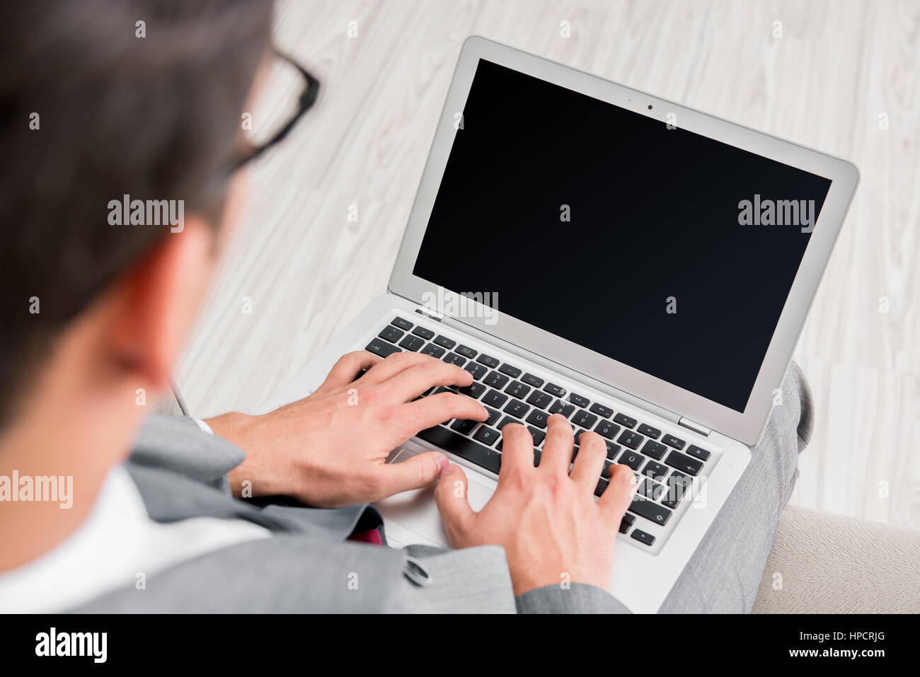 Businessman working with laptop in business concept Stock Photo - Alamy