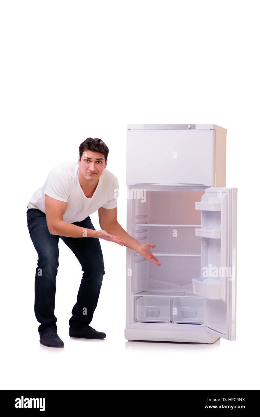 Man looking for food in empty fridge Stock Photo - Alamy