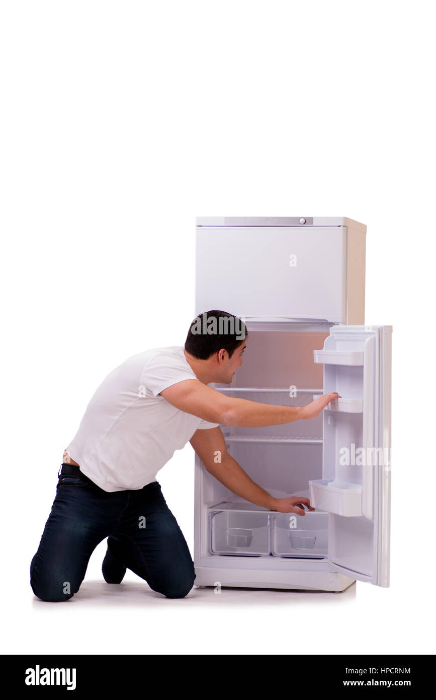 Man looking for food in empty fridge Stock Photo - Alamy