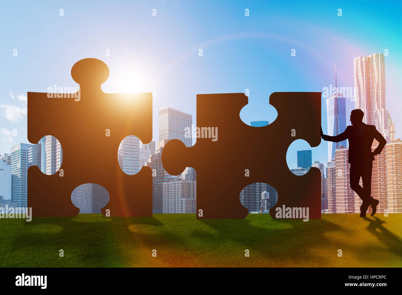 Business concept of teamwork with jigsaw puzzle Stock Photo - Alamy
