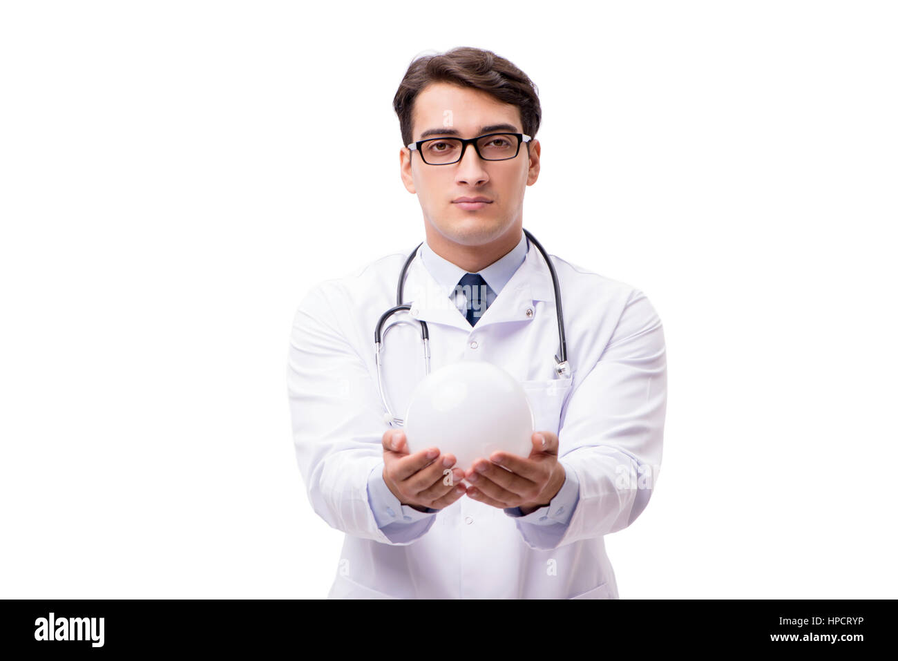 Doctor with crystal ball isolated on white background Stock Photo - Alamy