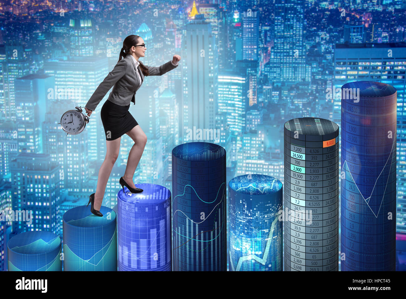 Businesswoman rushing with clock on bar charts Stock Photo - Alamy