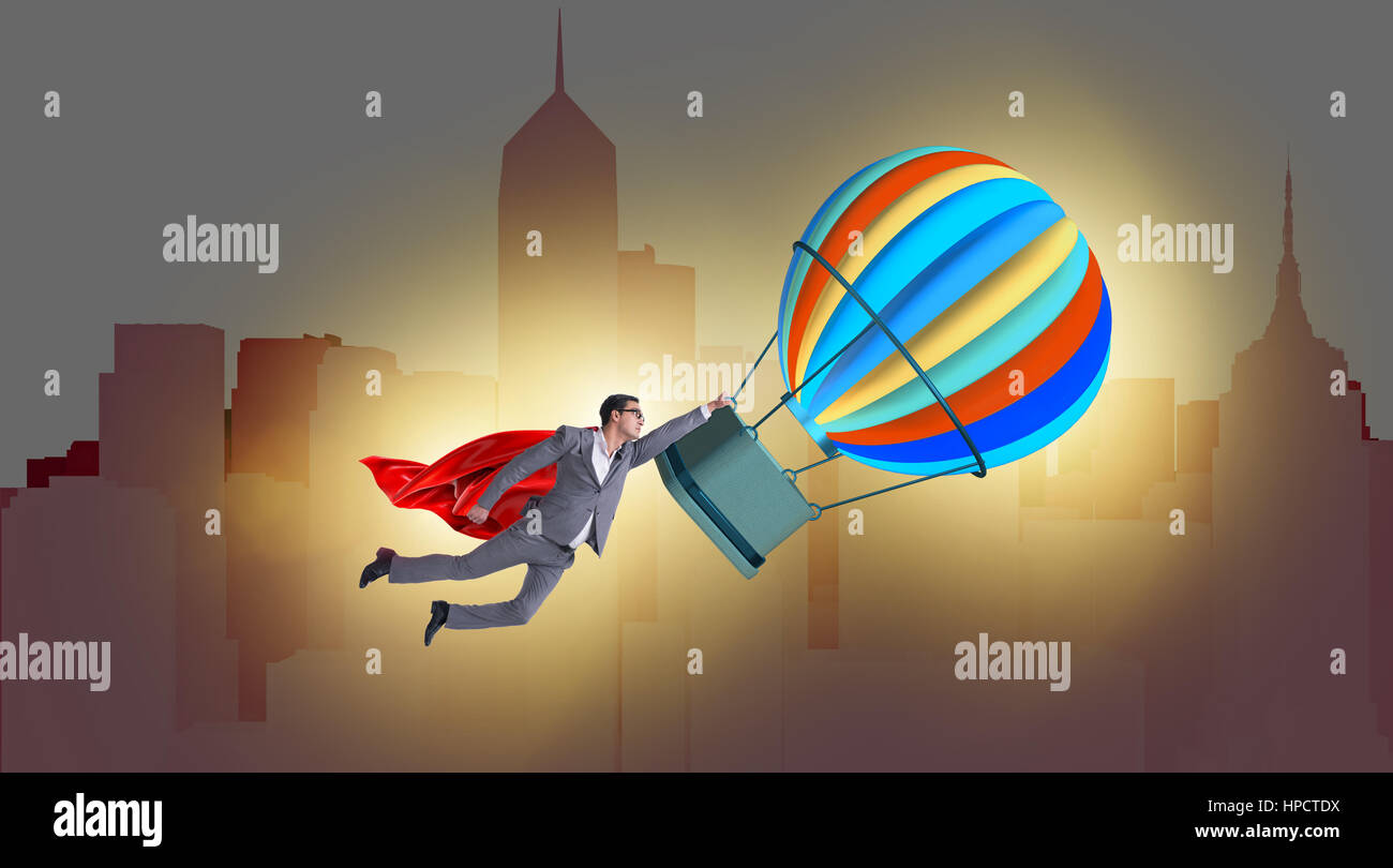 Businessman flying on balloon in challenge concept Stock Photo - Alamy