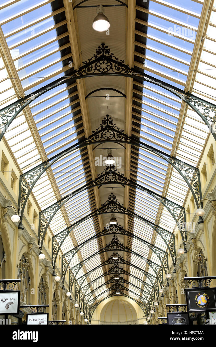 The Royal Arcade features a high glass roof and rows of arched windows ...