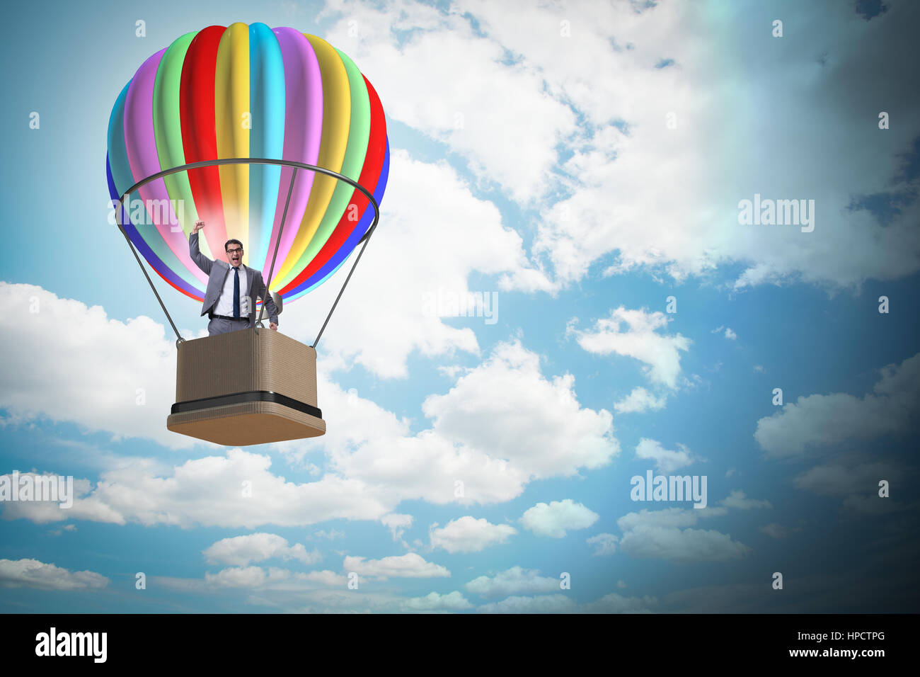 Businessman flying on balloon in challenge concept Stock Photo - Alamy